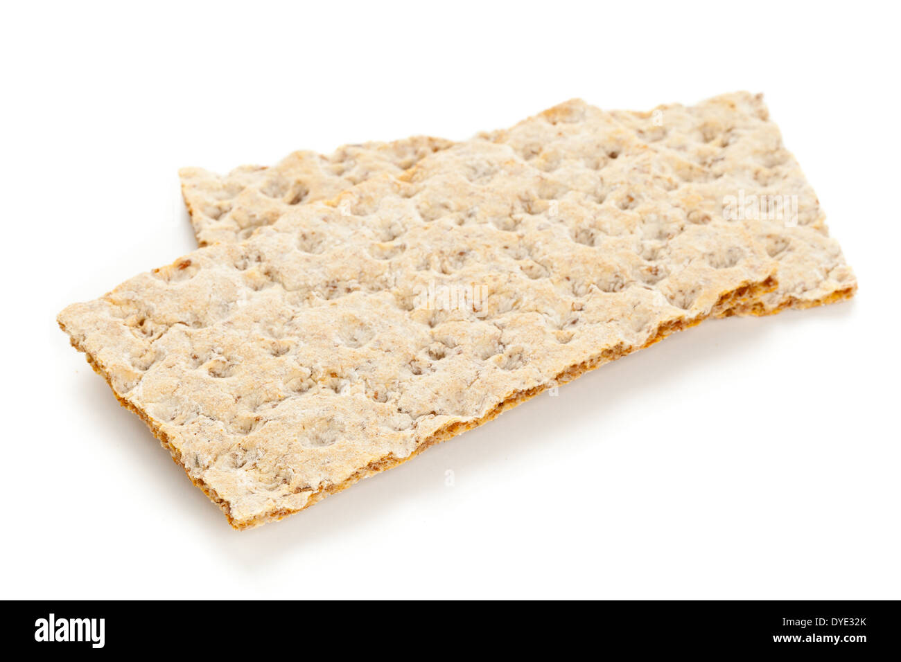 Two slices of wheat crispbread over white background Stock Photo - Alamy