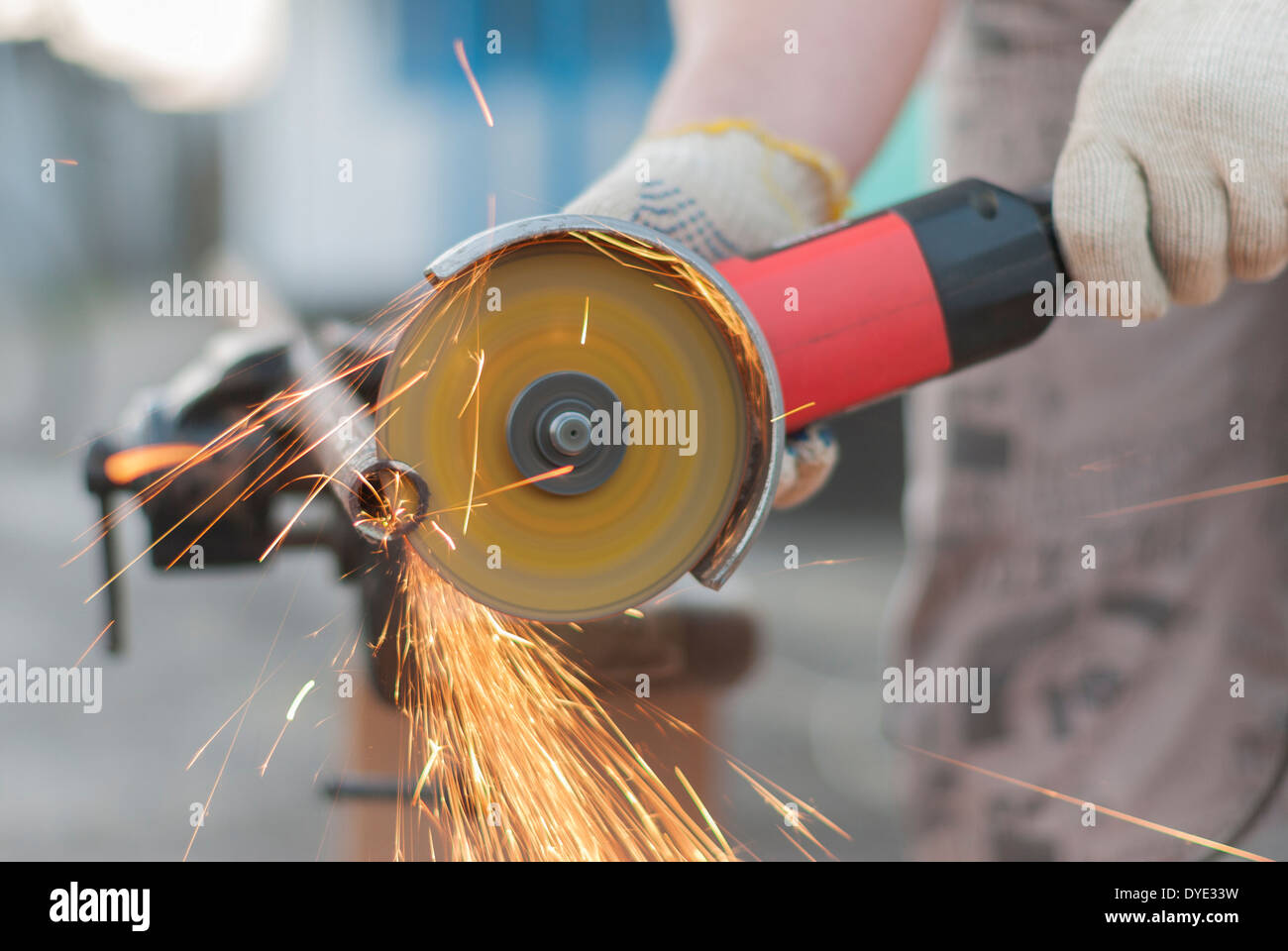 Worker cuts metal Stock Photo - Alamy