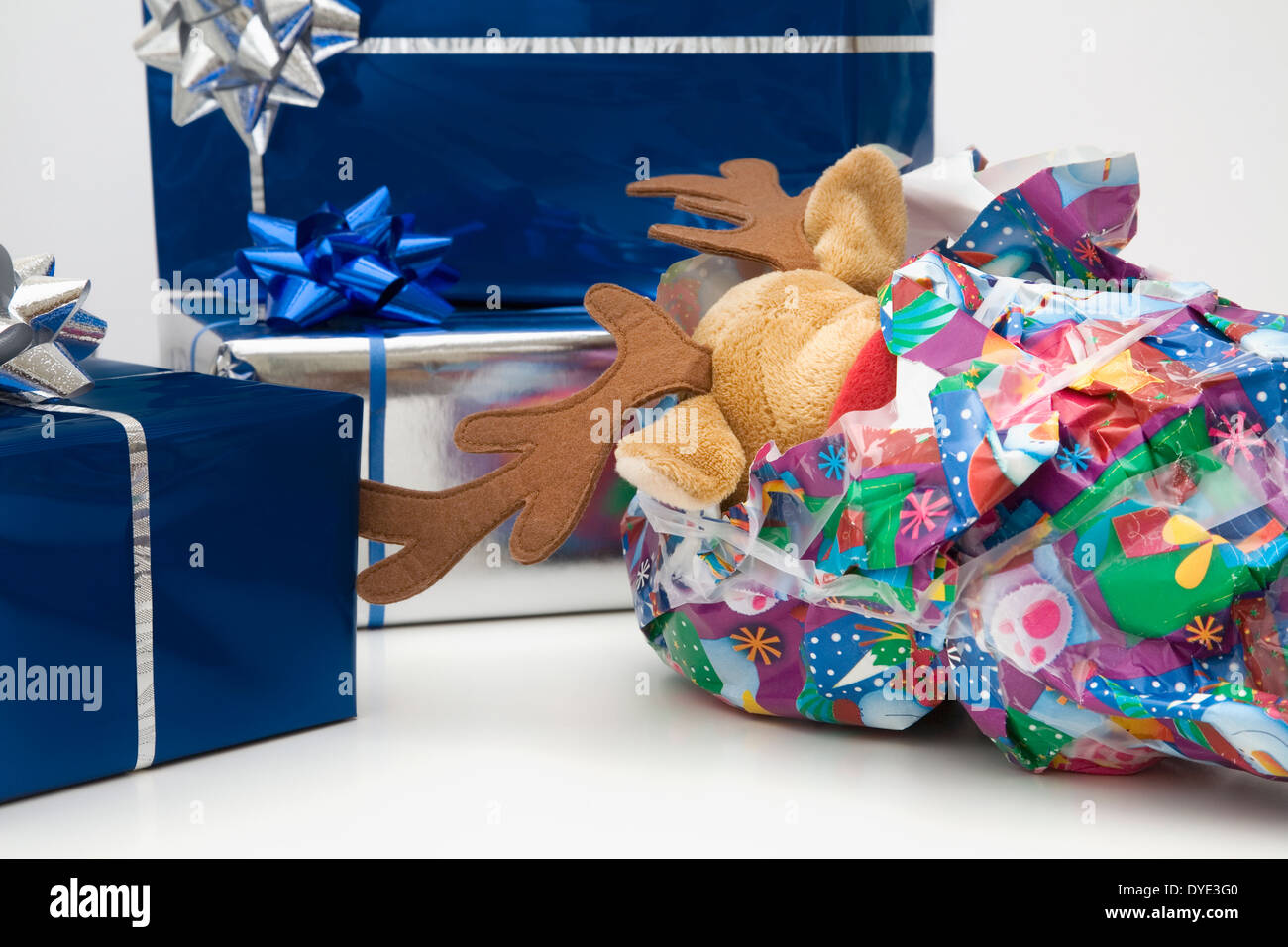 Close up shot of a Badly Wrapped Christmas present Stock Photo - Alamy
