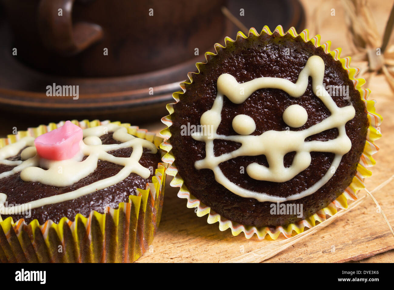 Homemade chocolate muffins with cat face decoration Stock Photo - Alamy