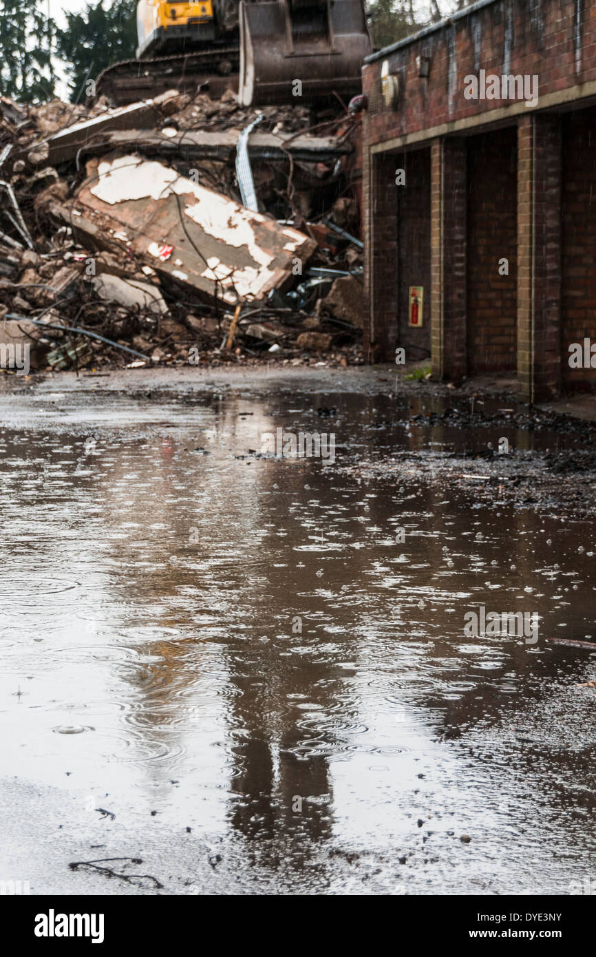 Heavy rain in a large puddle in the middle of a demolition site Stock ...