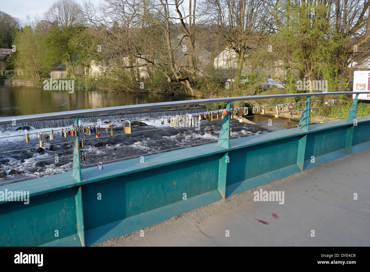 Love Locks on weir bridge a footbridge over the river Wye in Bakewell ...