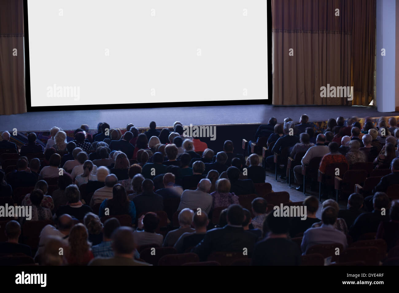 Audience watching cinema Stock Photo - Alamy