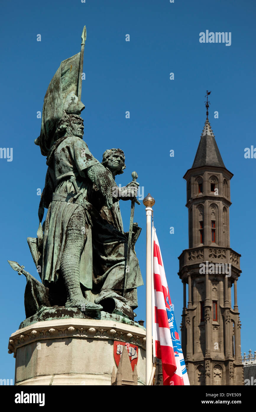 Statue of Jan Breidel and Peter de Coninck, with the Historium tower ...
