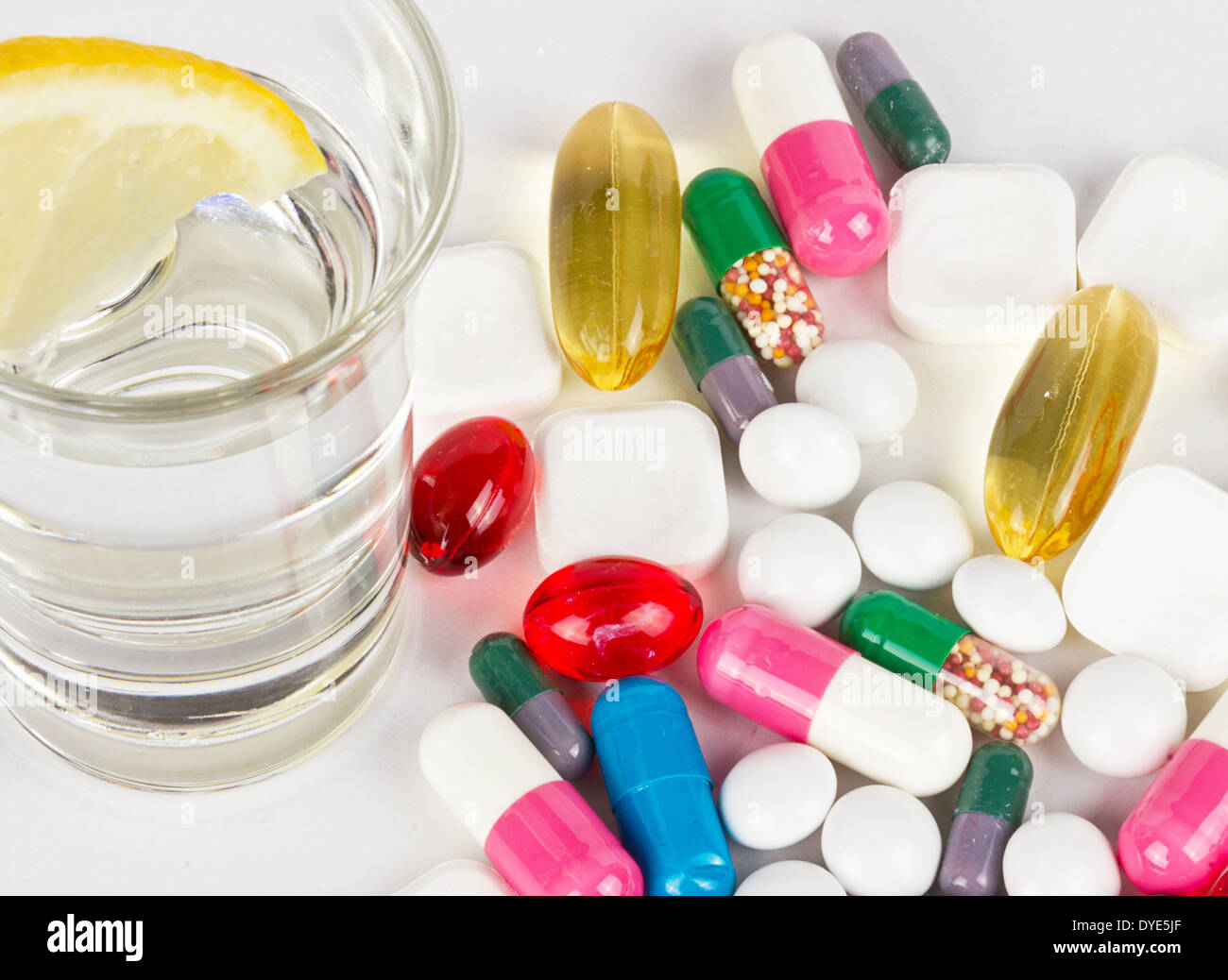 Alcohol and pills Stock Photo - Alamy