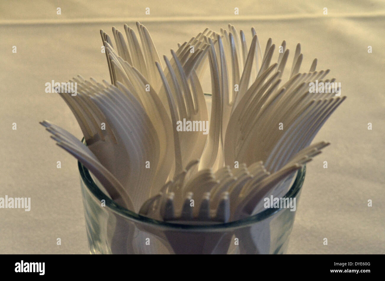 Plastic forks in a glass at the wedding buffet Stock Photo - Alamy