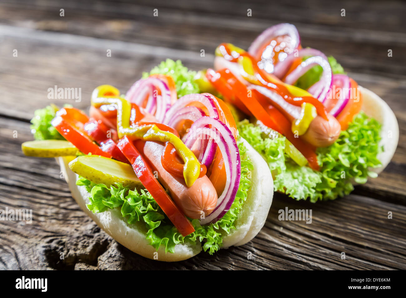 Two homemade hot dog with fresh vegetables Stock Photo - Alamy