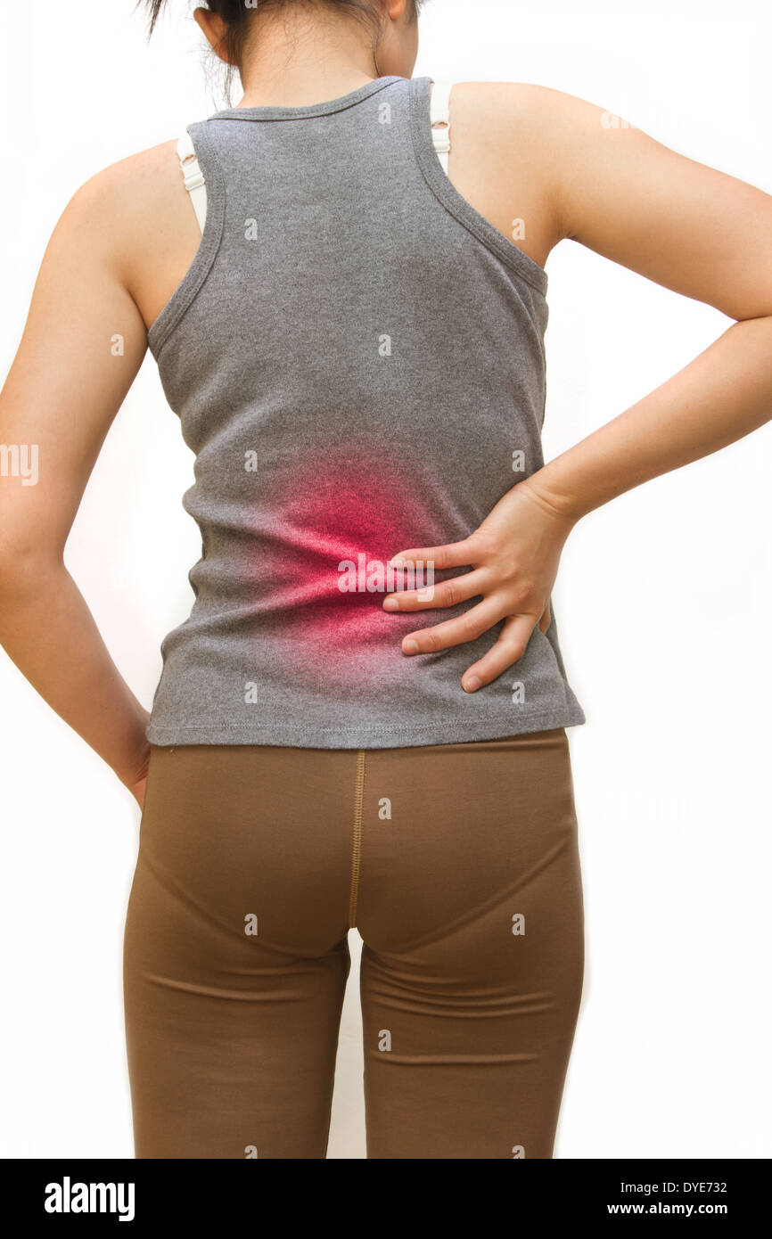 Attractive female suffers from backache.Low back pain Stock Photo - Alamy