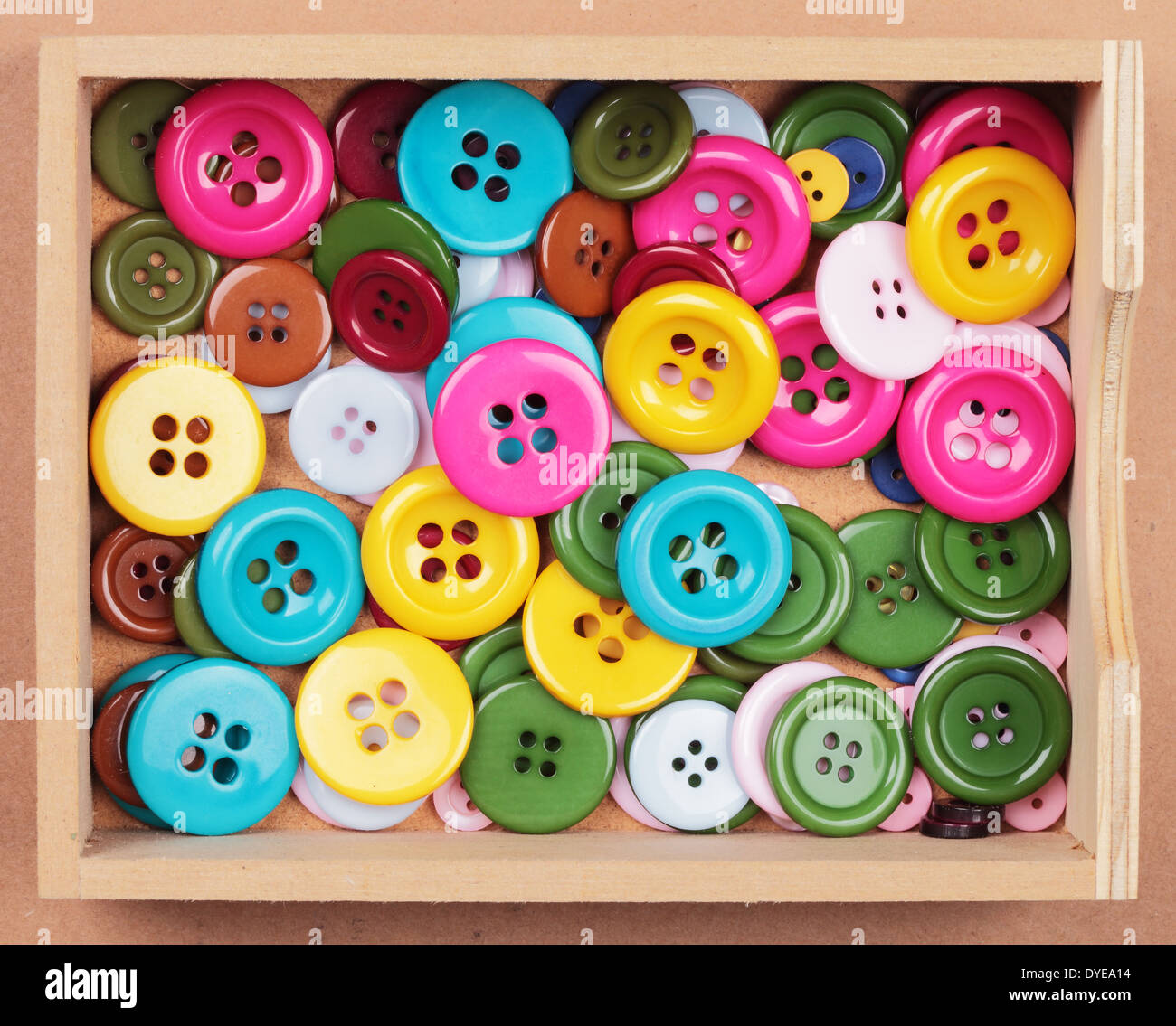 a collection with many buttons of different colors and sizes in a box ...