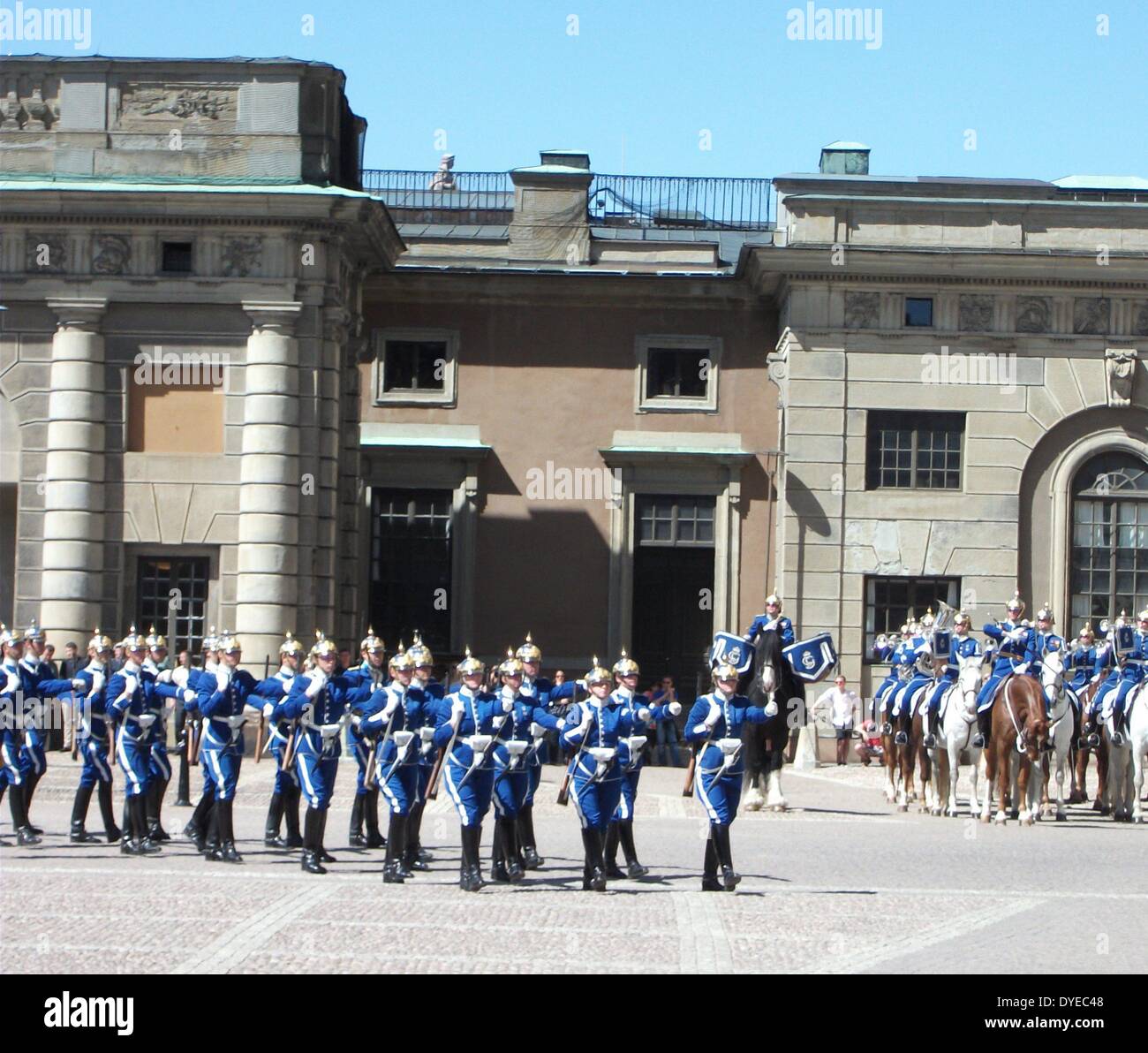 A military honour guard on parade at the Royal Palace in the city of ...