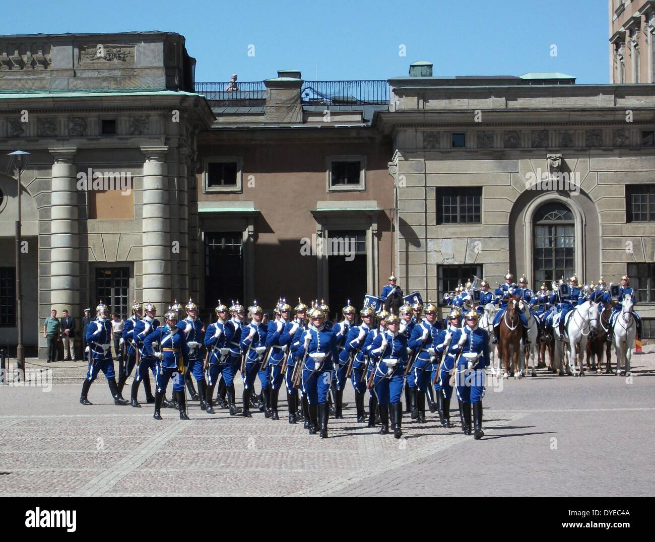 A military honour guard on parade at the Royal Palace in the city of ...