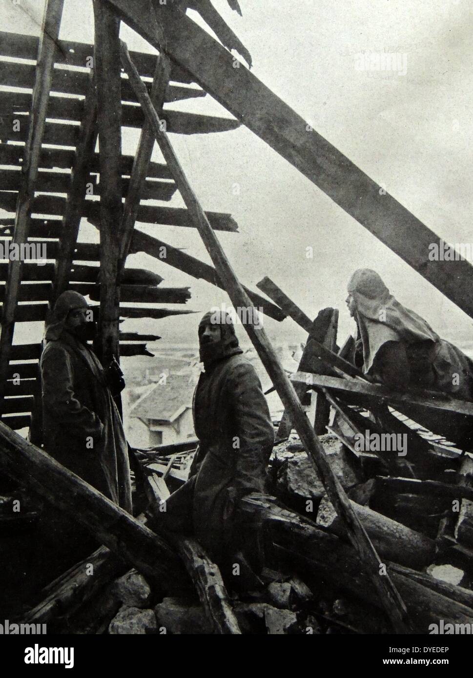 Soldiers stand at the observation post created to monitor the movements ...