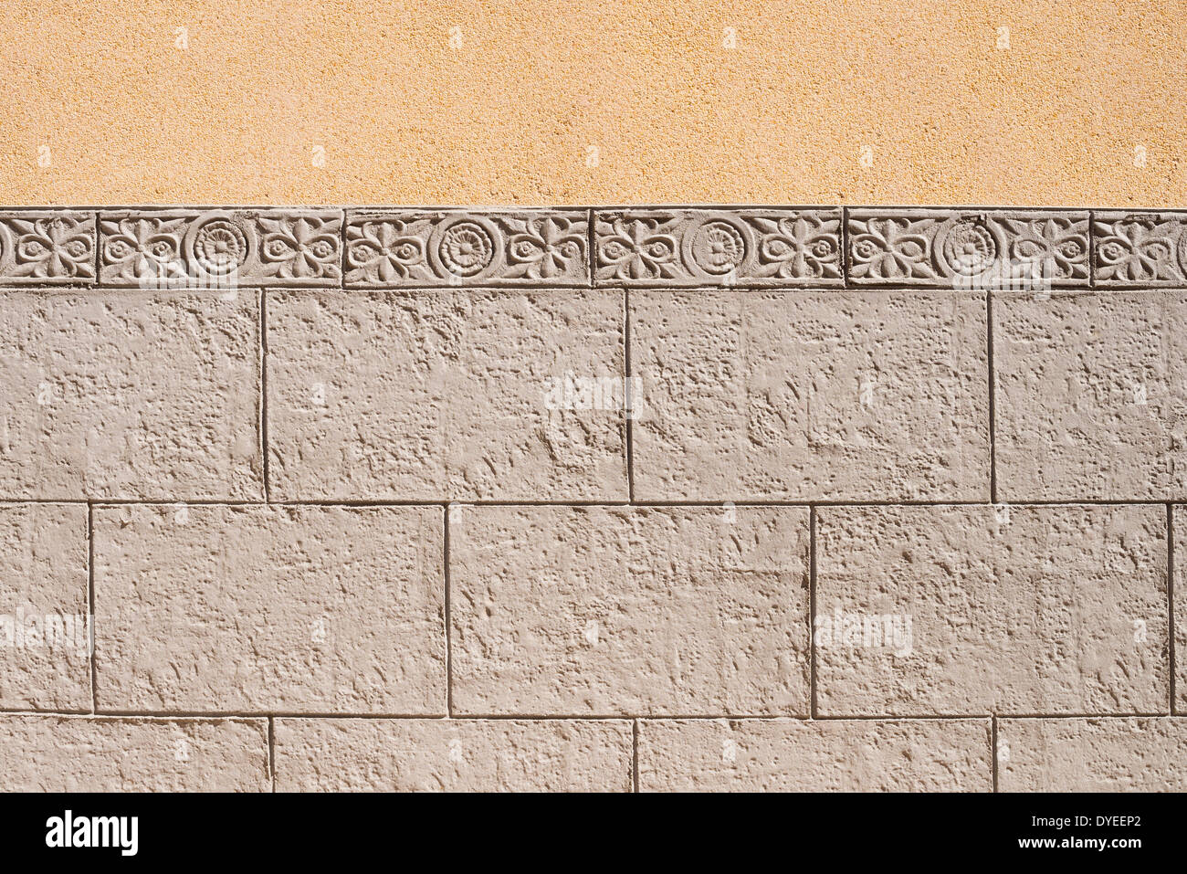 Ornamental wall cladding using granite bricks with floral motives Stock ...
