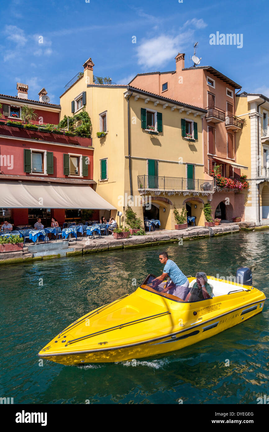 A Tourist Taking A Speedboat Trip, Malcesine, Lake Garda, Italy Stock ...