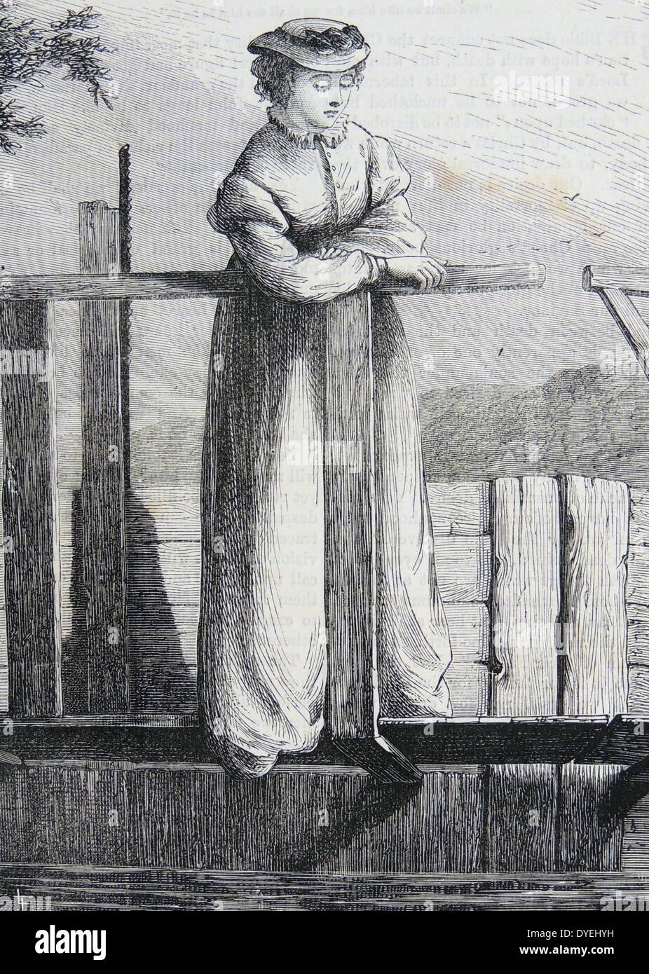 Woman standing on the wooden bridge across wooden pound lock gates ...