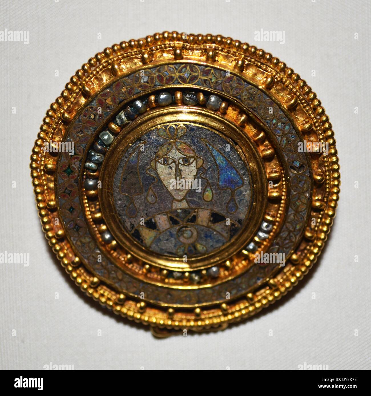 The Castellani Brooch 700 A.D. Central image depicts a human bust ...