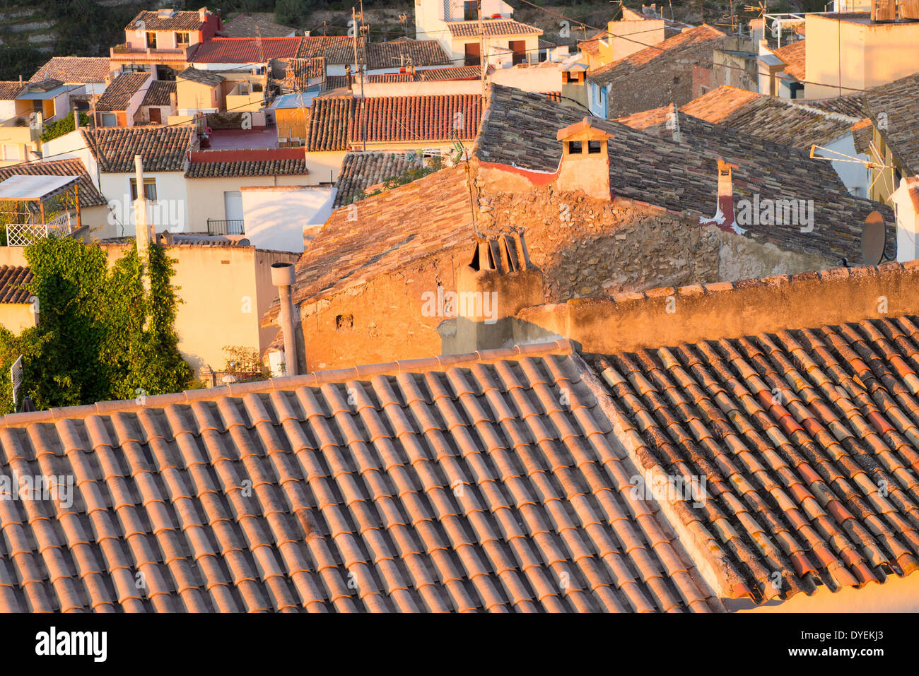 Full frame take of tiled rooftops and chimney of a traditional ...