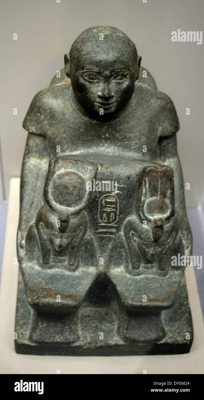 Serpentine Statue Depicting the Official Harwa Presenting Two Female ...