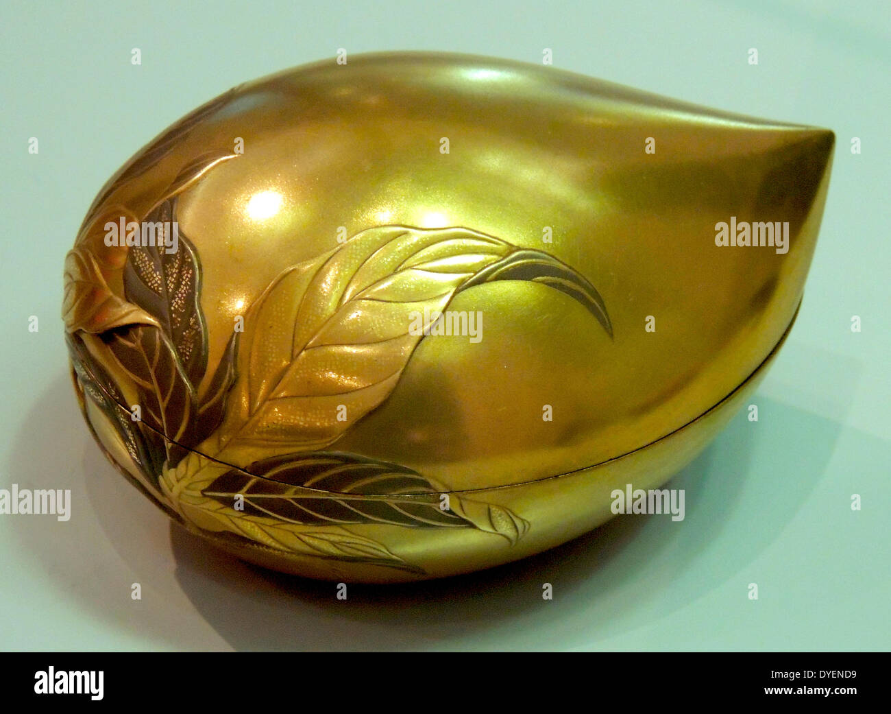 Japanese gilded, box in the shape of a persimmon fruit. Wood with ...