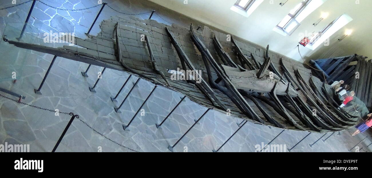 The Oseberg ship . A Viking ship discovered in a large burial mound at ...