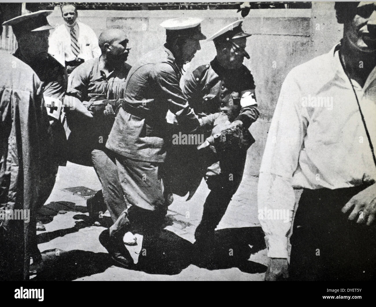 casualty from street fighting arrives at a Barcelona hospital during ...