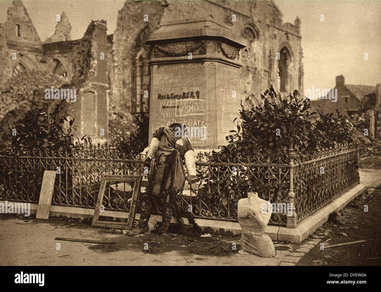 The desecration of the monument to St Catherine at Peronne. The statue ...