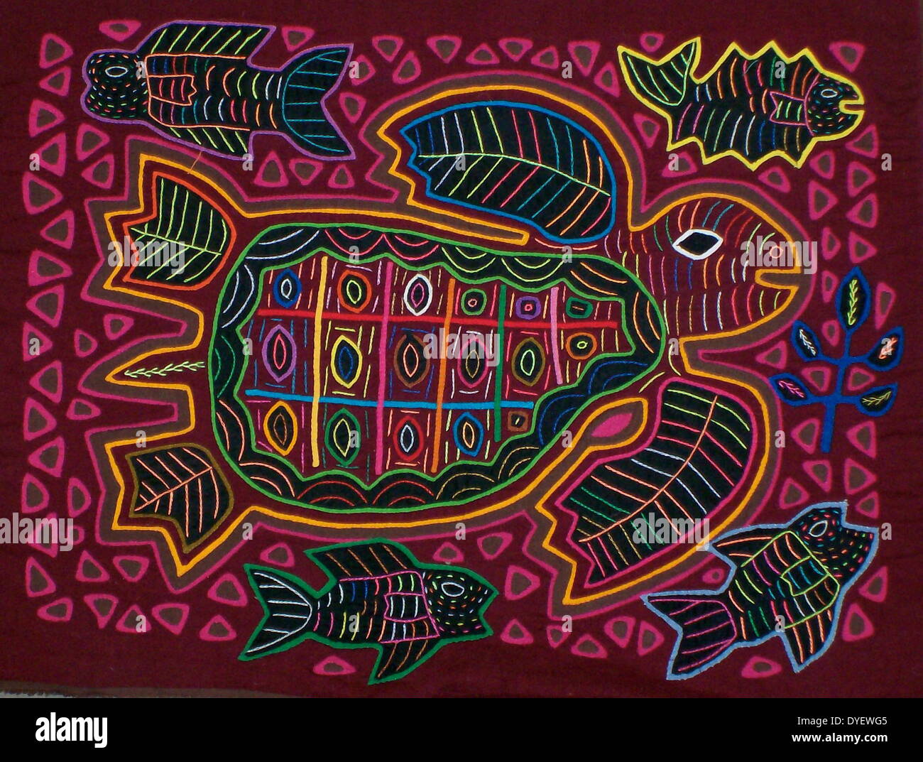 Mola textile by Kuna Indian artist, depicting a turtle swimming with ...