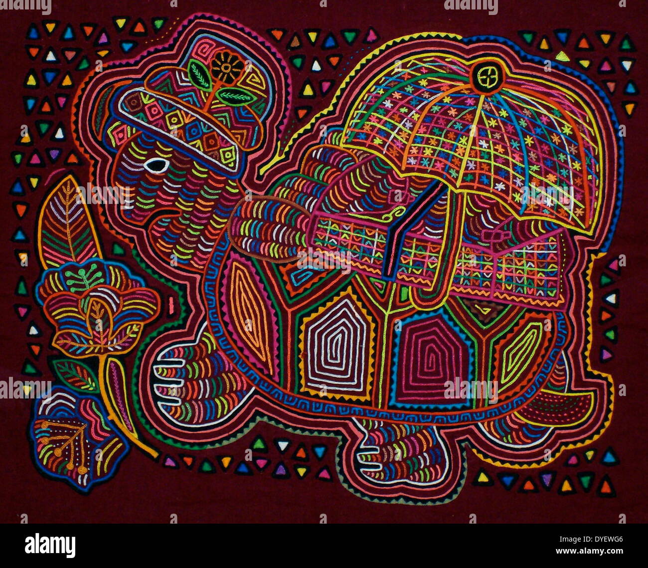 Mola textile by Kuna Indian artist, depicting a turtle wearing a hat ...