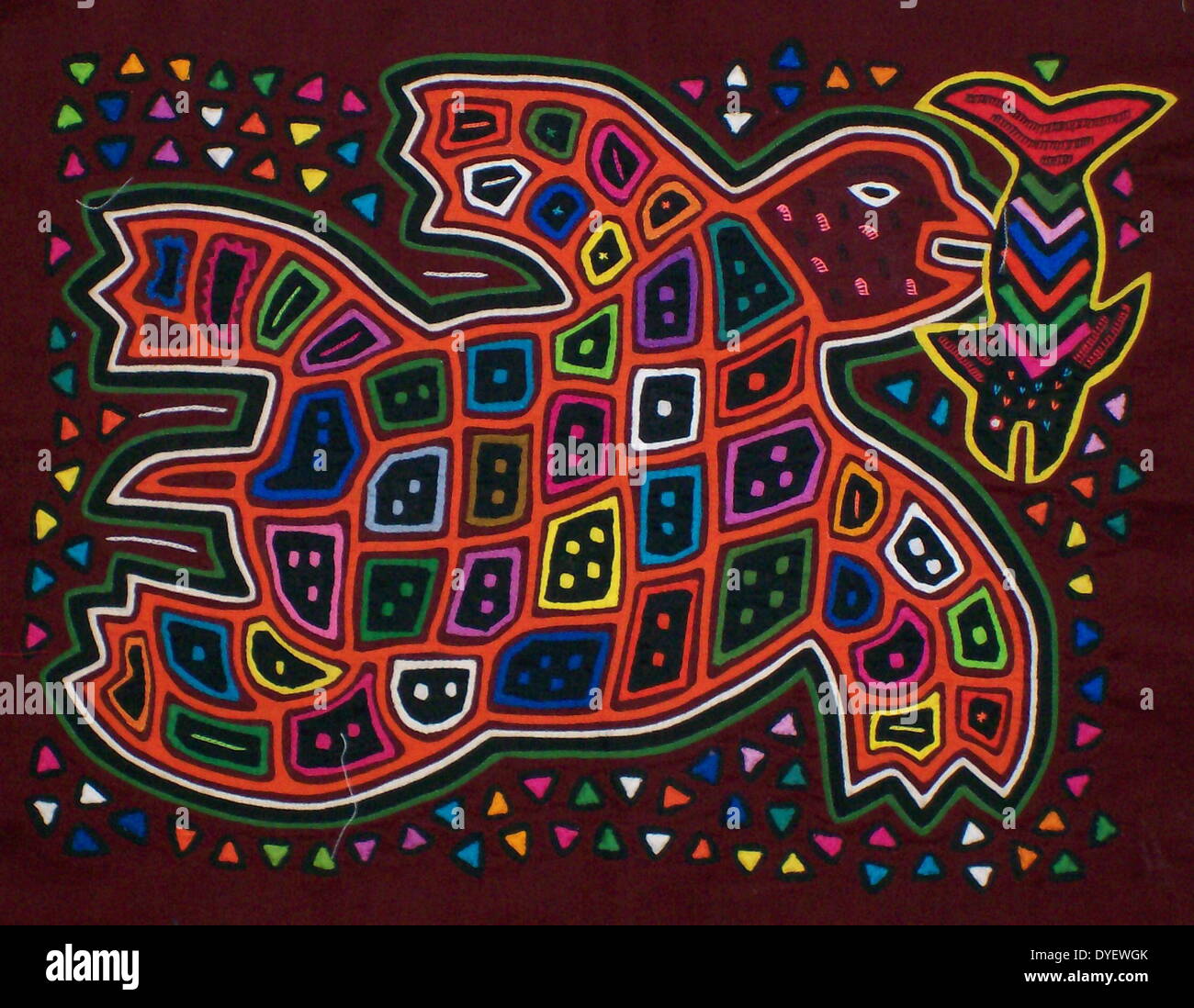 Mola textile by Kuna Indian artist, depicting swimming turtle biting ...