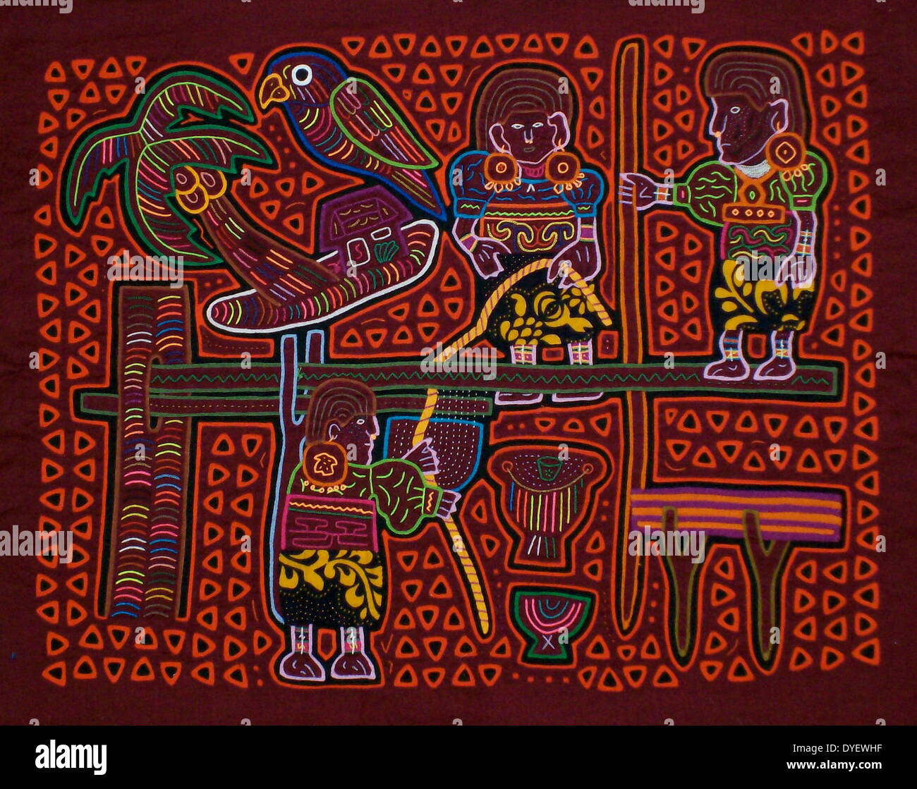 Mola textile by Kuna Indian artist, depicting a parrot in a tree while ...