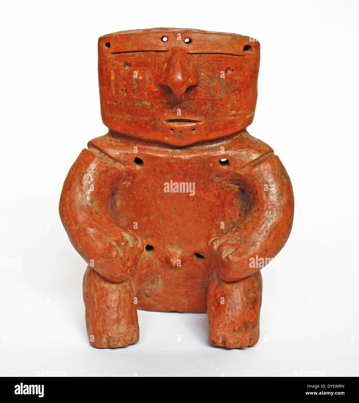 Slab-head figure from Quimbaya, Colombia, AD 1000. Seated pottery ...