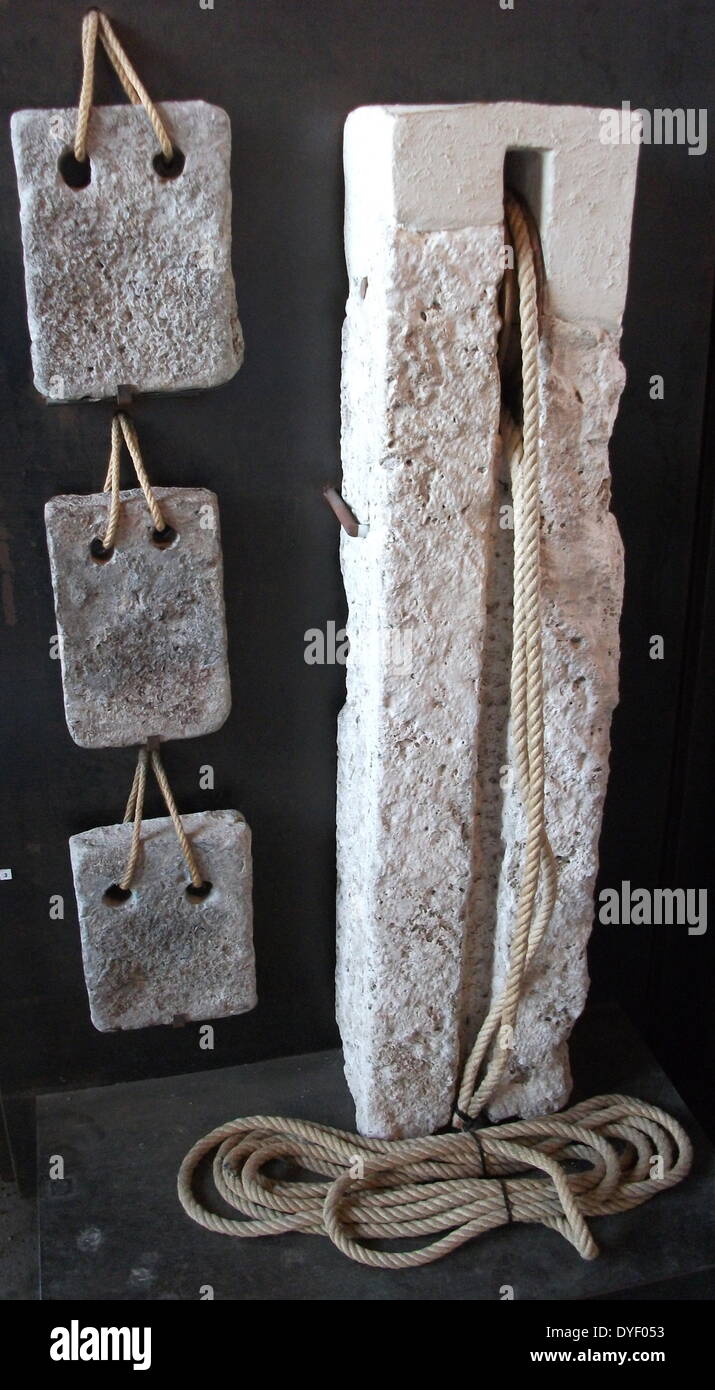 Lead weights and part of a hoist used in the underground structure if ...