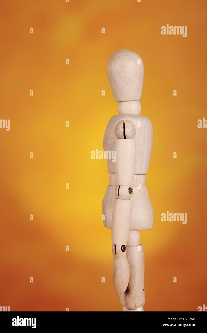 a dummy on a yellow background Stock Photo - Alamy