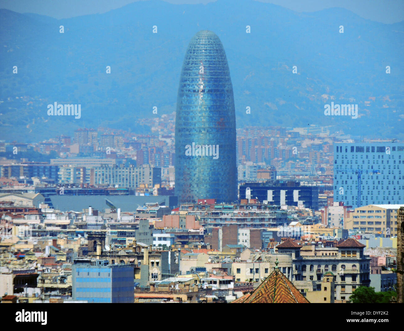 View over Barcelona with the Torre Agbar skyscraper or tower, between ...