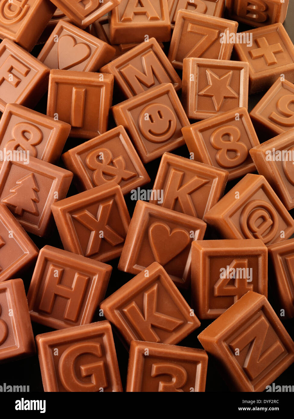 ASSORTED SQUARES OF MILK CHOCOLATE WITH LETTERS, NUMBERS AND SHAPES ...