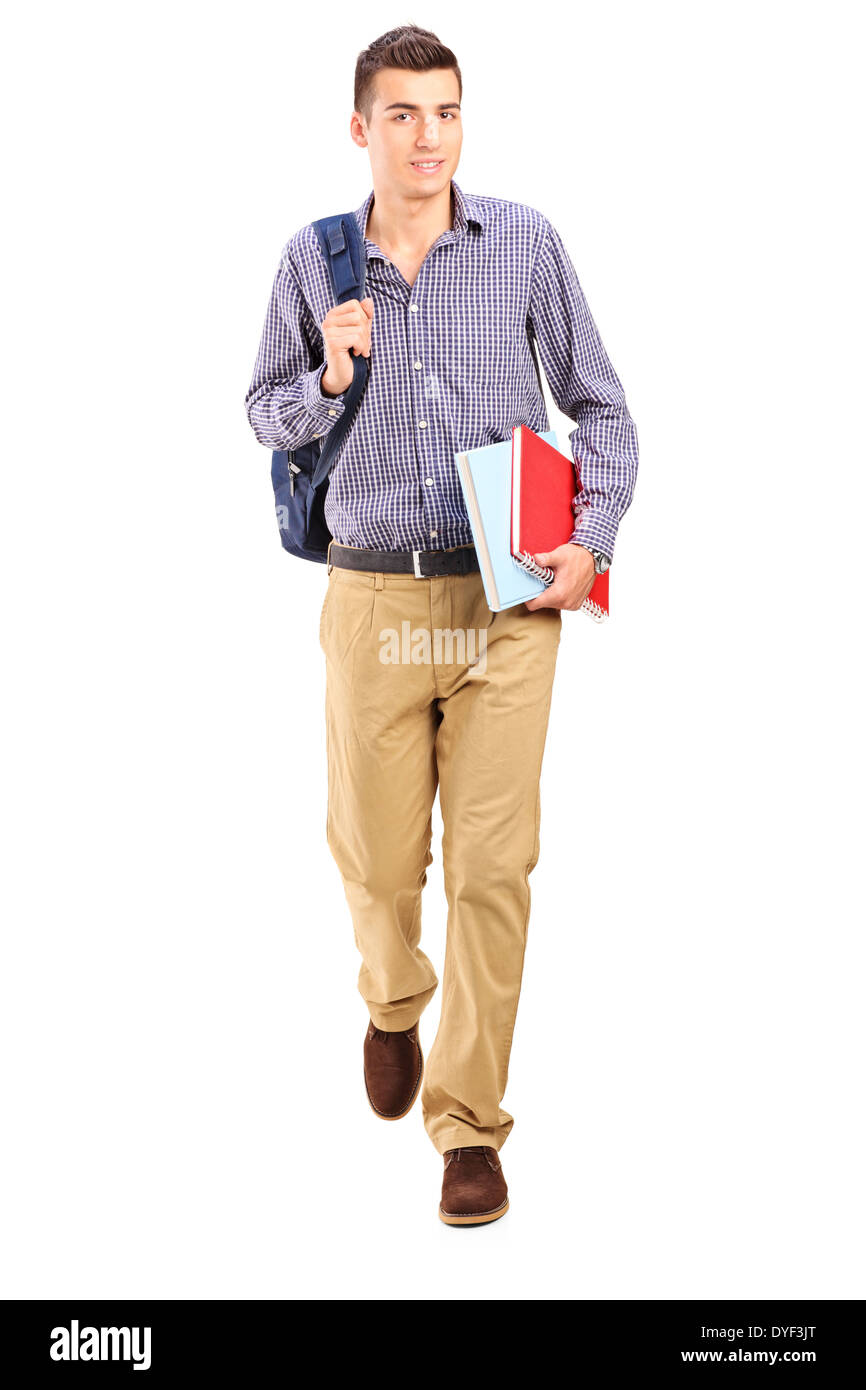 Full length portrait of a male student walking with backpack Stock ...