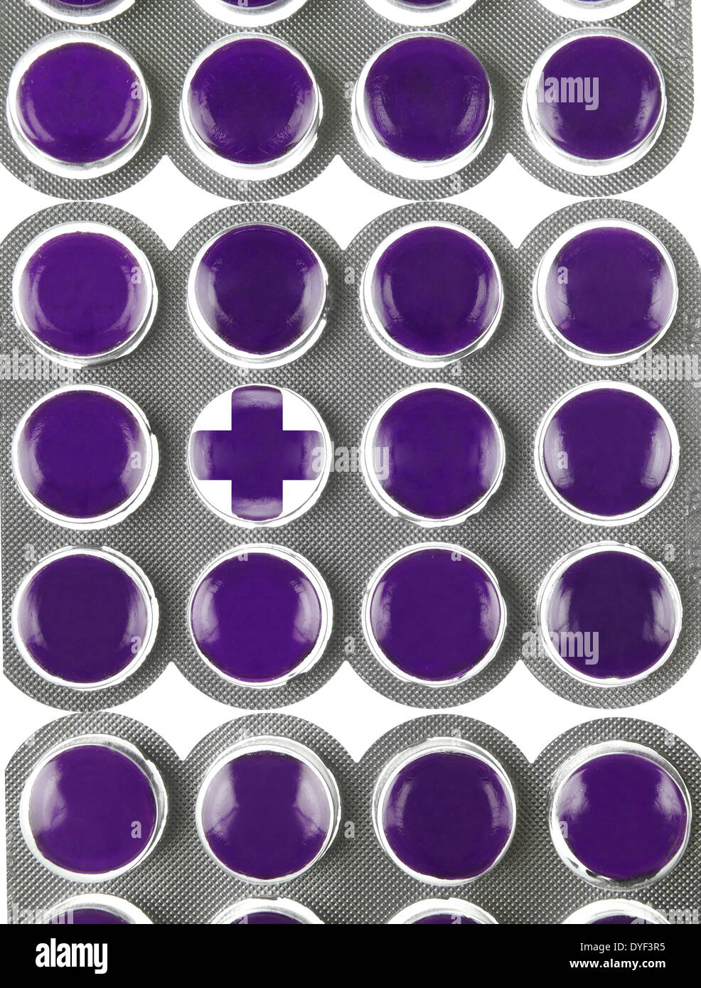 PACKETS OF PURPLE THROAT LOZENGES WITH ONE AS A CROSS Stock Photo - Alamy