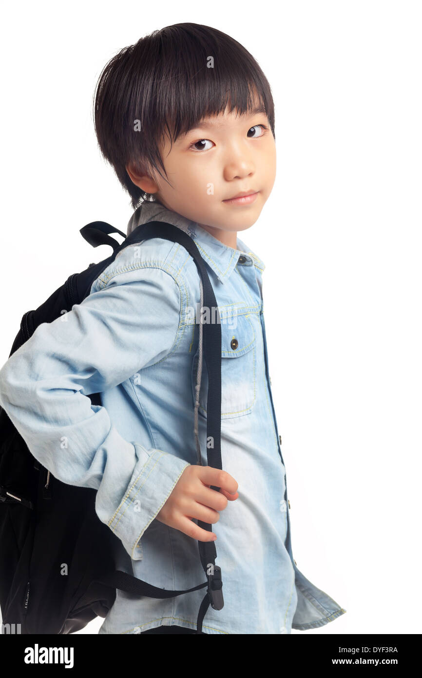 Boy with school bag isolated on white background Stock Photo - Alamy