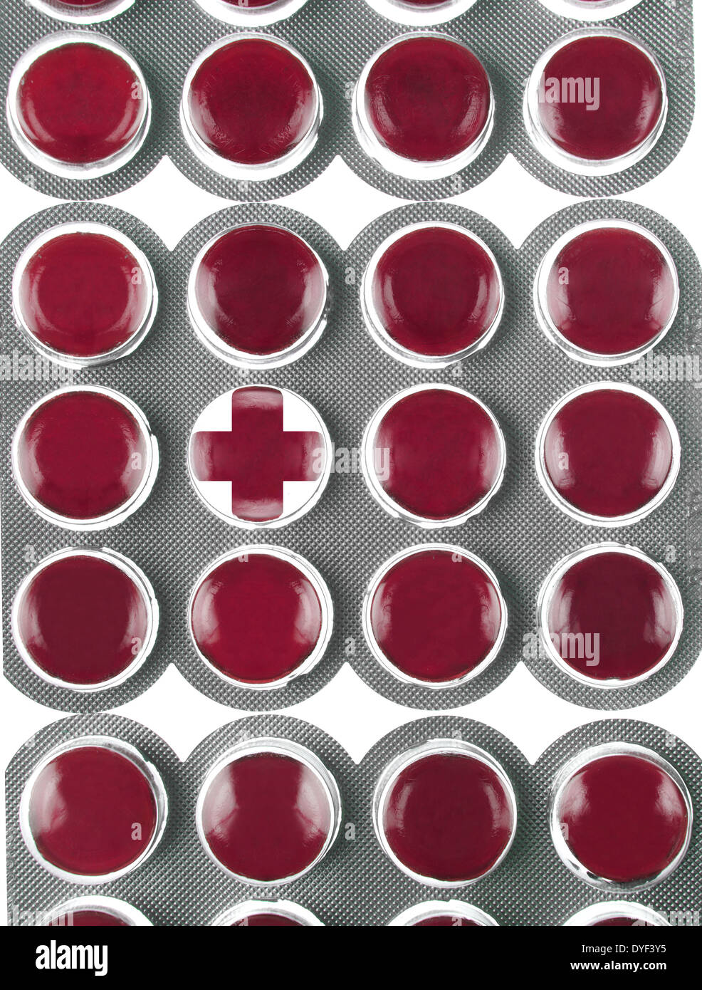 PACKETS OF RED THROAT LOZENGES WITH ONE AS A CROSS Stock Photo - Alamy