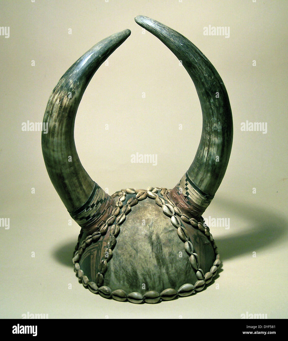 Nigerian horned helmet, decorated with cowrie shells Stock Photo - Alamy