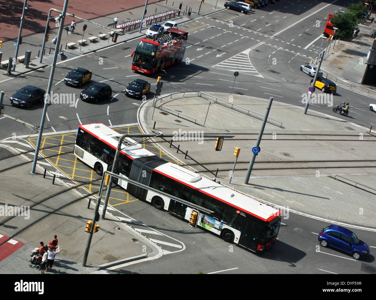 Street Scene With Bus Turning Round a Roundabout 2013 Stock Photo - Alamy