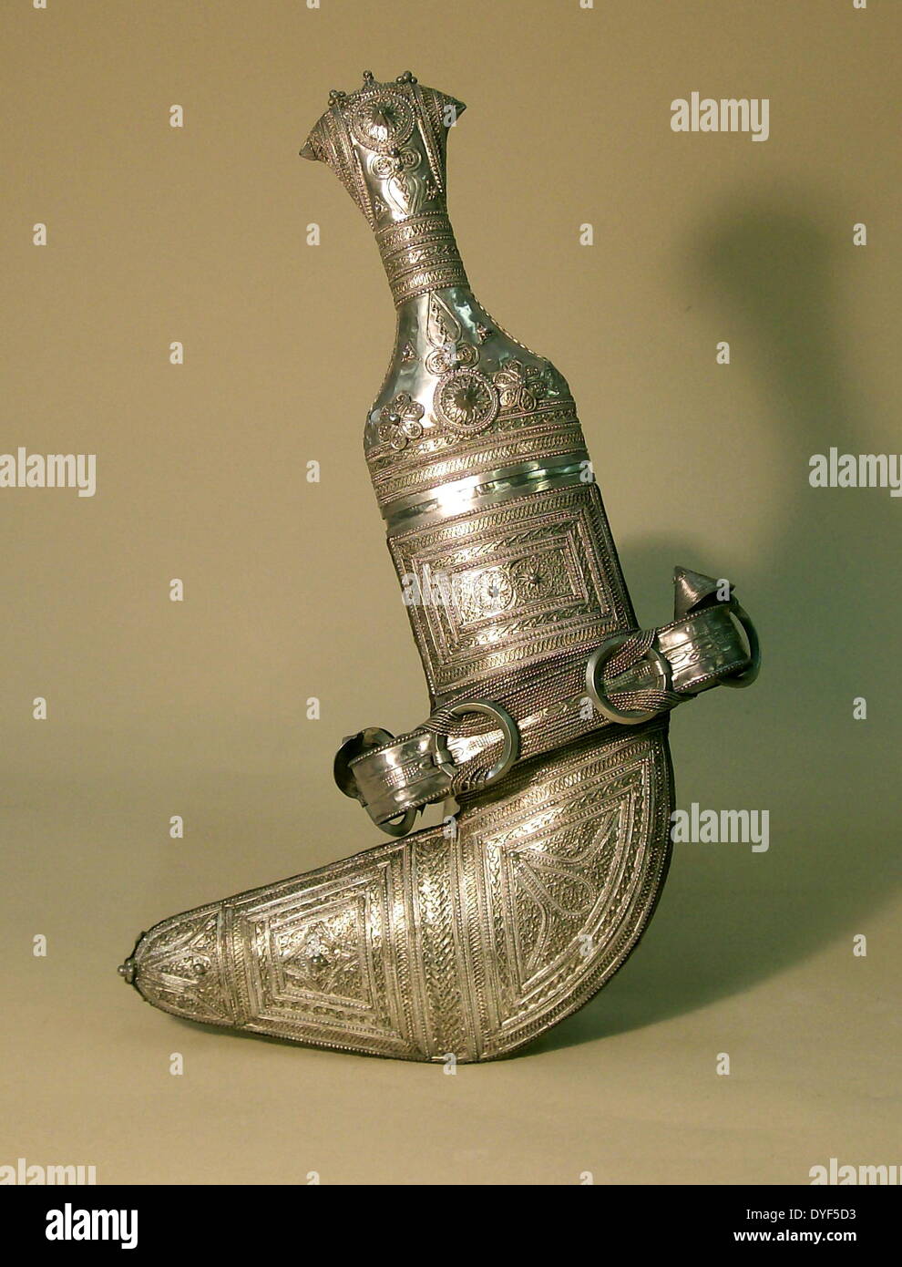 Omani decorated dagger. The Khanjar, or curved dagger, is now only used ...