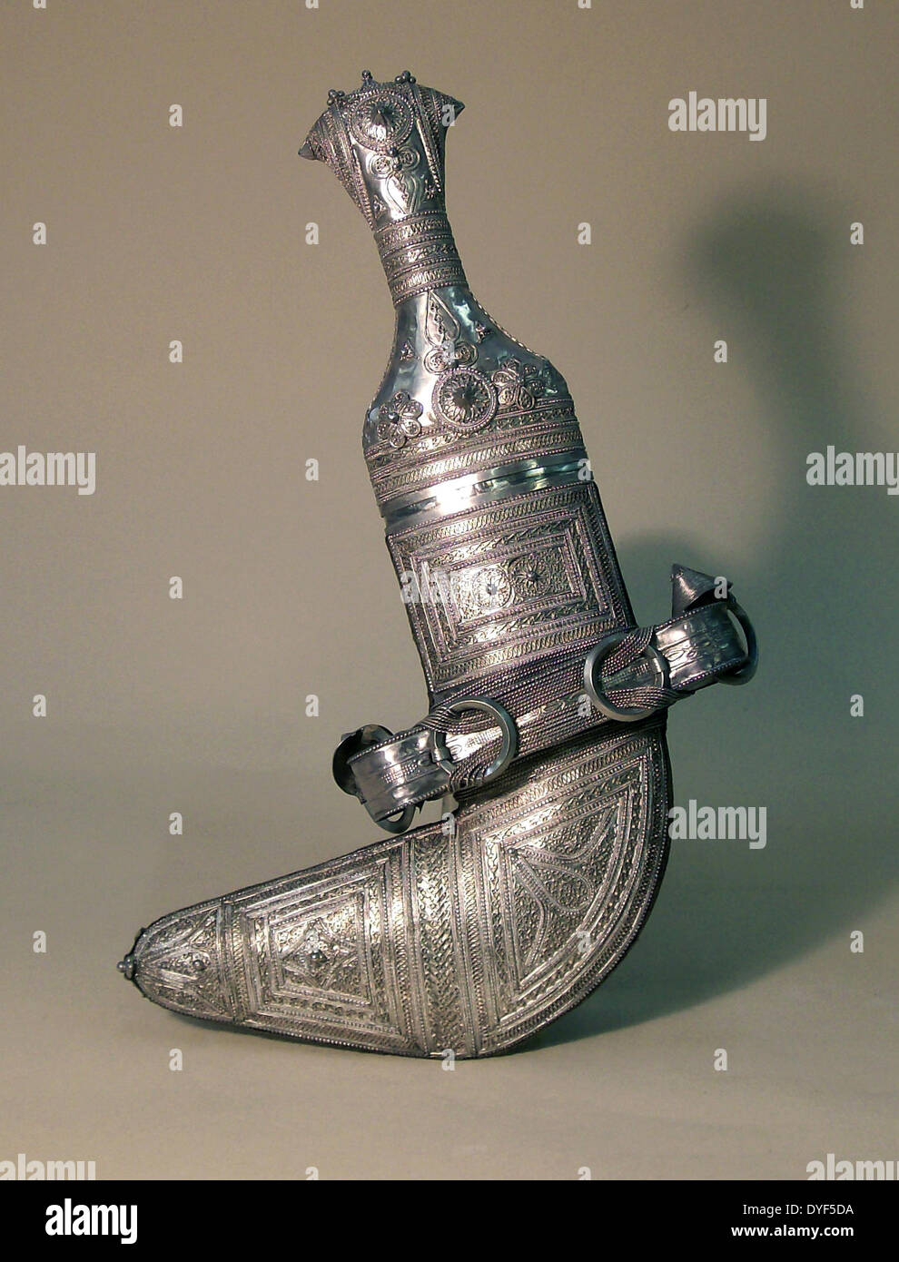 Omani decorated dagger. The Khanjar, or curved dagger, is now only used ...