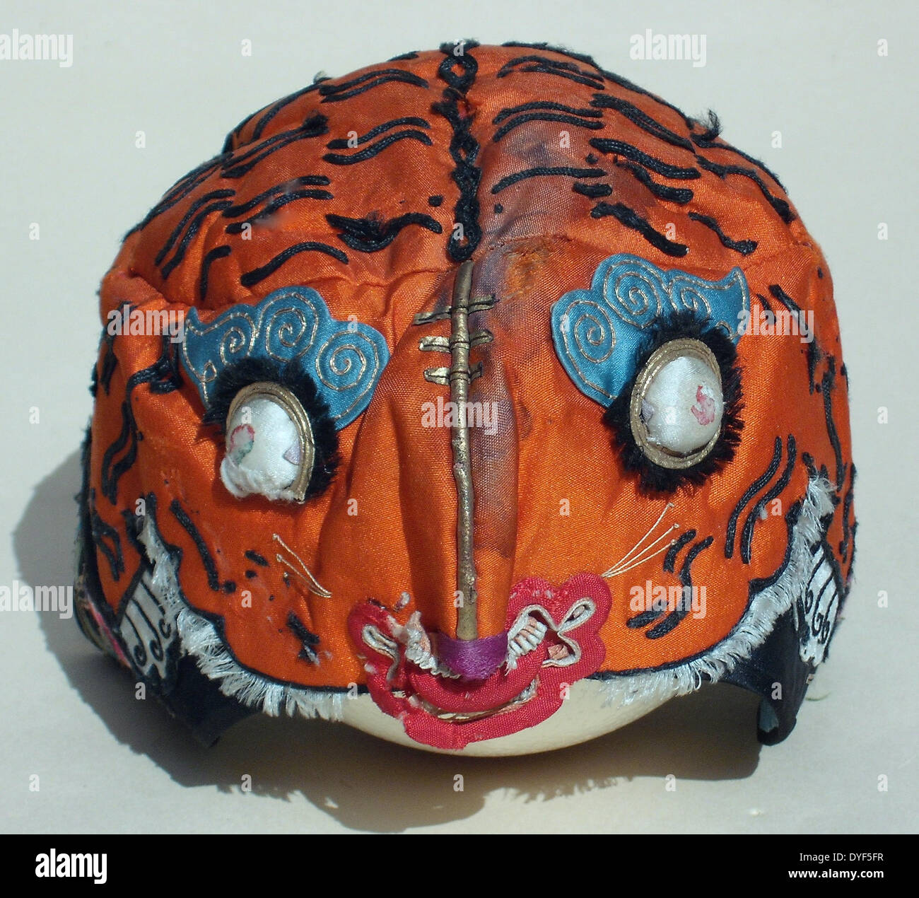 Chinese child's ceremonial Tiger Hat, embroidered silk Stock Photo - Alamy