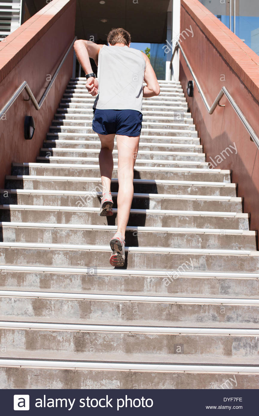 Man Running Up Stairs Stock Photos & Man Running Up Stairs Stock Images ...