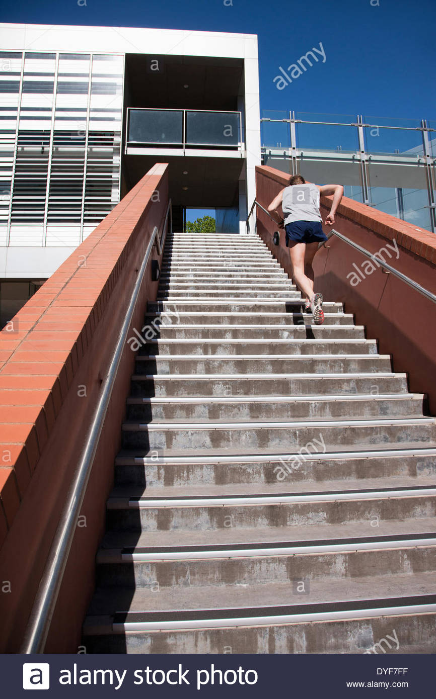 Man Running Up Stairs Stock Photos & Man Running Up Stairs Stock Images ...