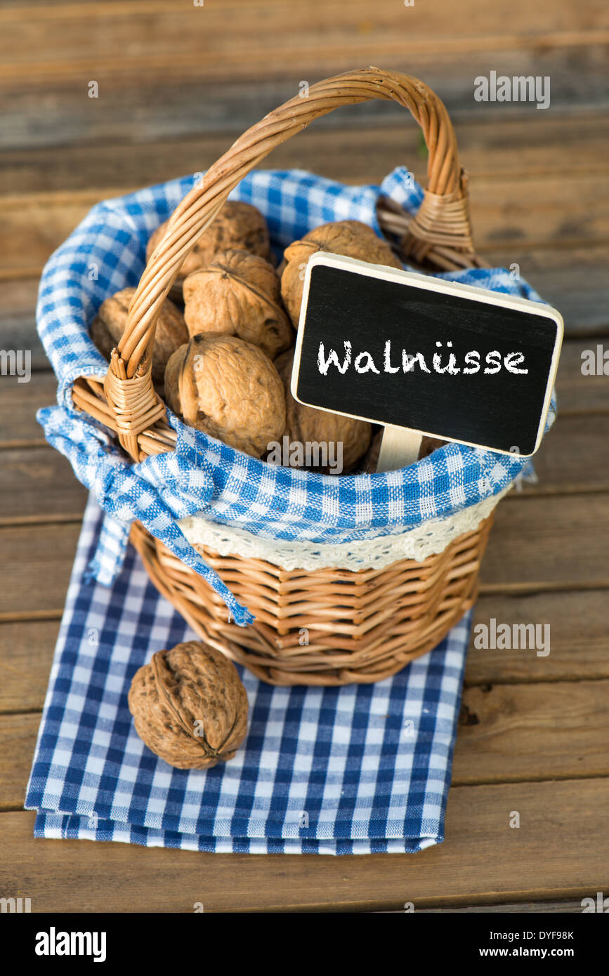 Walnuts in a little basket Stock Photo - Alamy