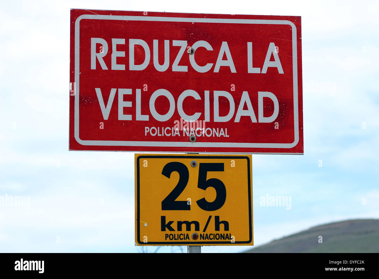 A road sign indicating a reduction in the speed limit on a highway near ...