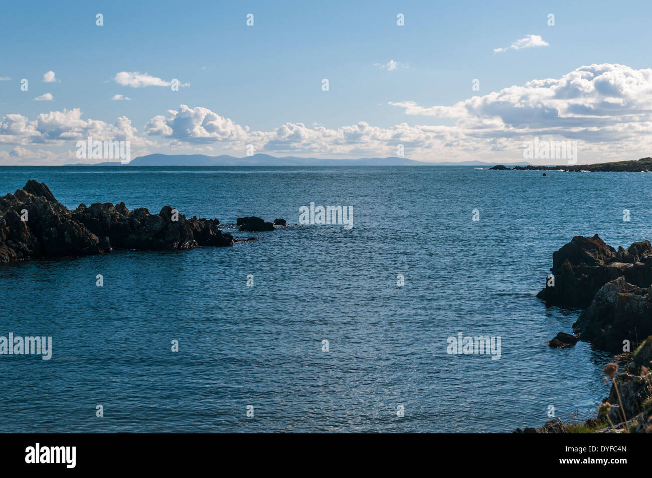 Looking over calm waters of the Irish sea towards the Isle of Man from ...