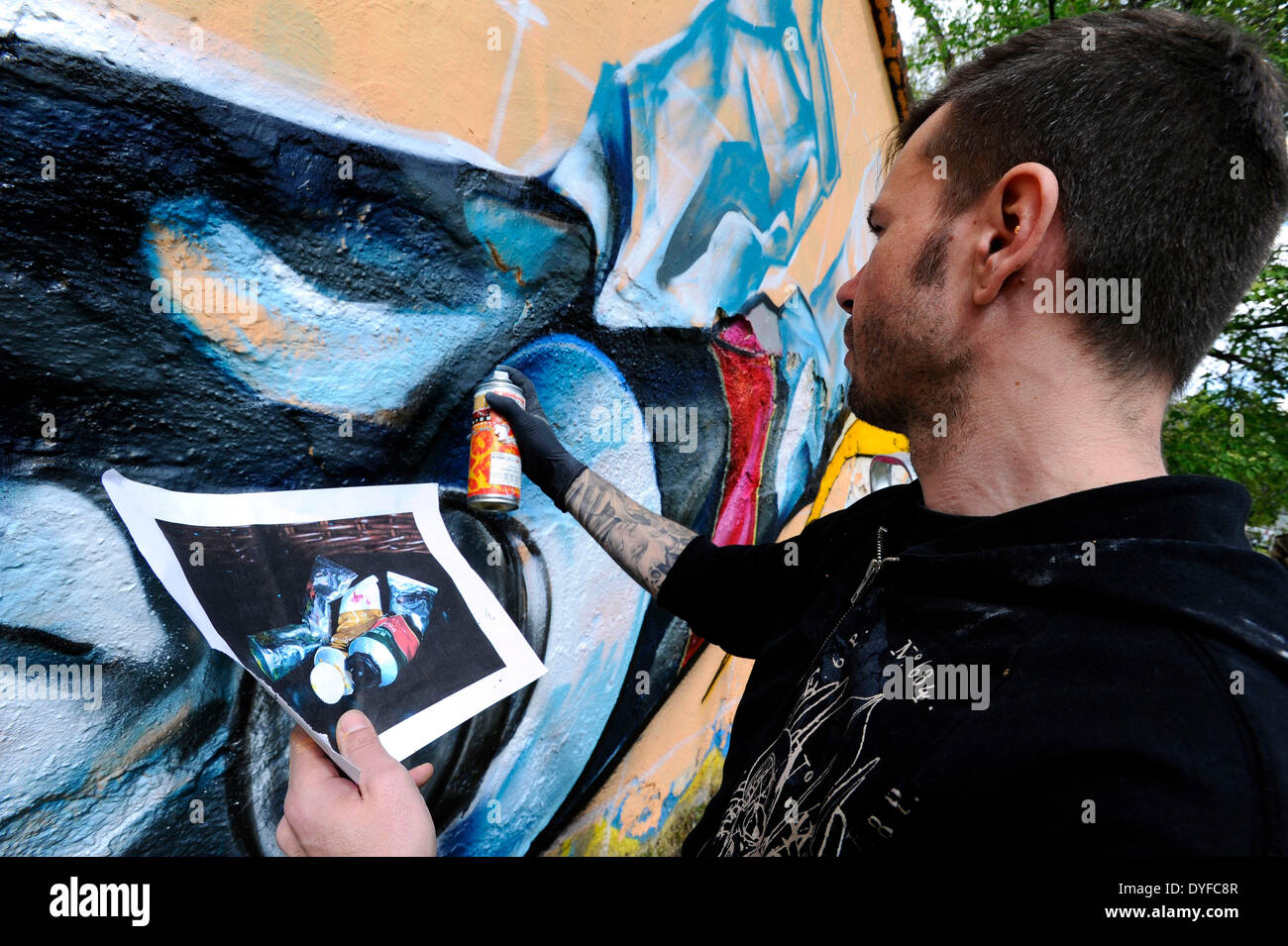 Wall decorated with graffiti with themes from the opera The Cunning ...